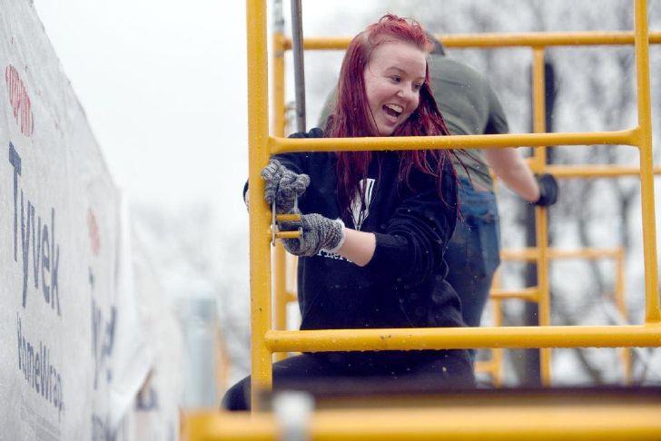 Scaffolding in the rain | The Courier PHOTOS: Volunteers work to build ...