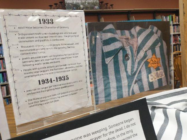 Upper library remembers Holocaust with display | The Courier Contains ...