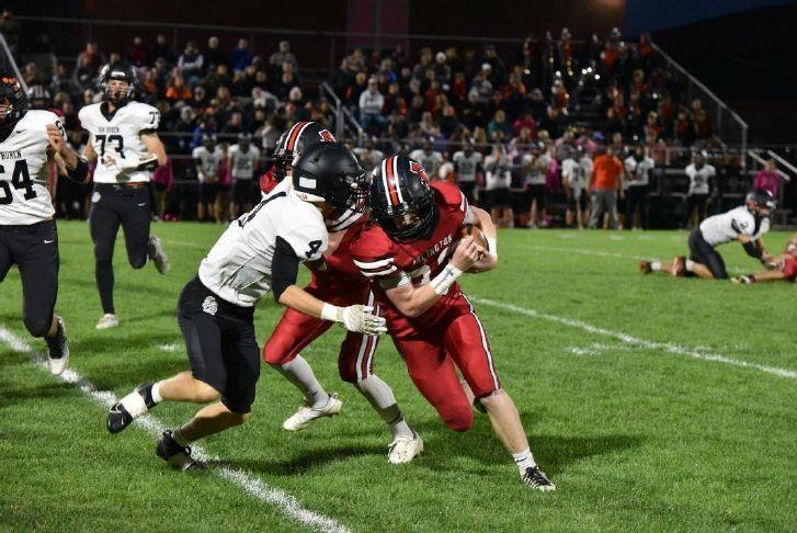 Russell scores three touchdowns as Red Devils down Van Buren | The ...
