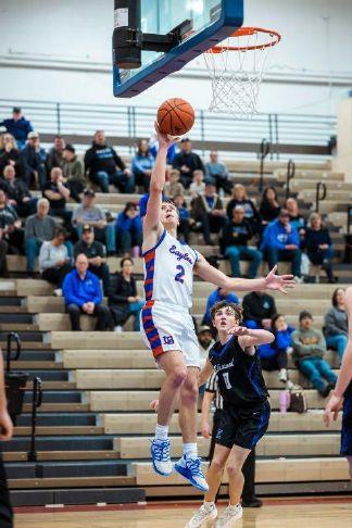 To the hoop | The Courier A photo from Friday's Elmwood/Liberty-Benton ...