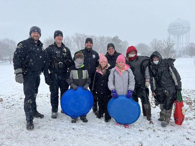 Cops go sledding | Sandusky Register Sandusky police take part in ...