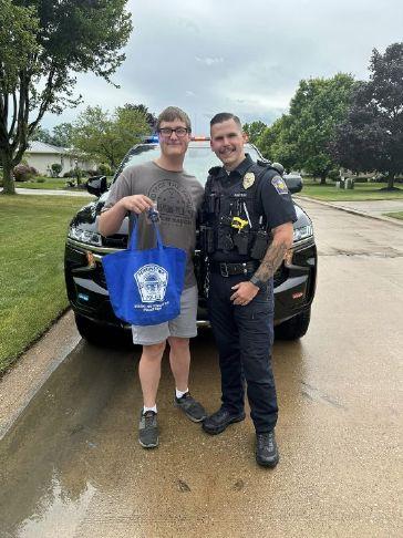 Perkins police's No. 1 fan recognized | Sandusky Register Officer drops ...