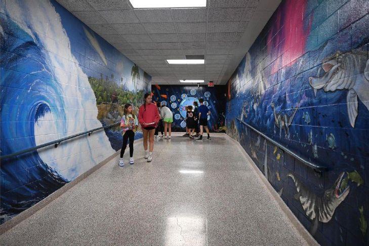 Science comes to life | Sandusky Register 344-foot mural depicts evolution