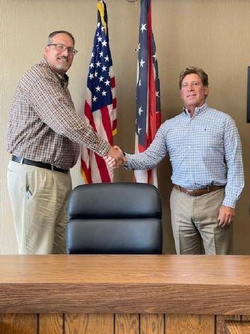 Carey swears in new mayor after Rathburn resigns | Advertiser-Tribune Carey